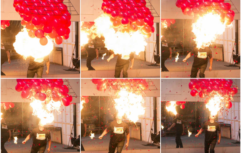 Most balloons burst with a blown flame by a fire breather | 吉尼斯世界纪录